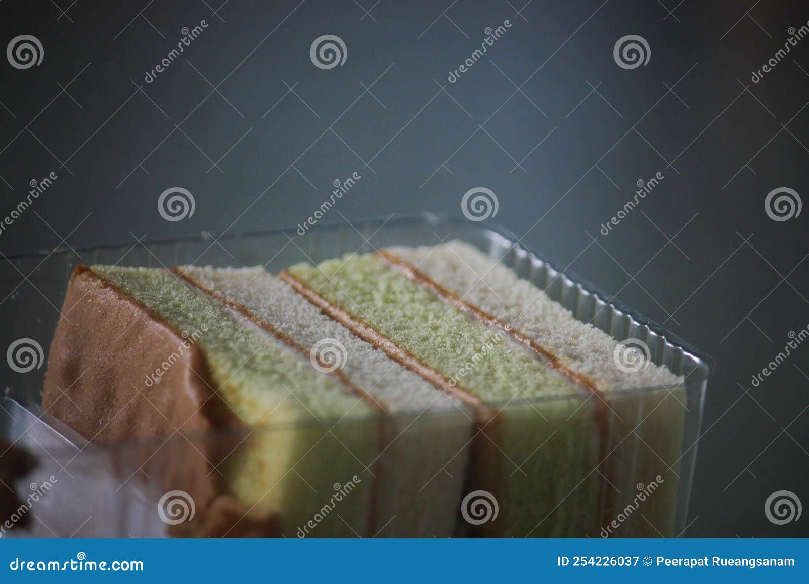 Close-up Shot of the Pandan Layer Cake in the Plastic Box. Stock Image ...