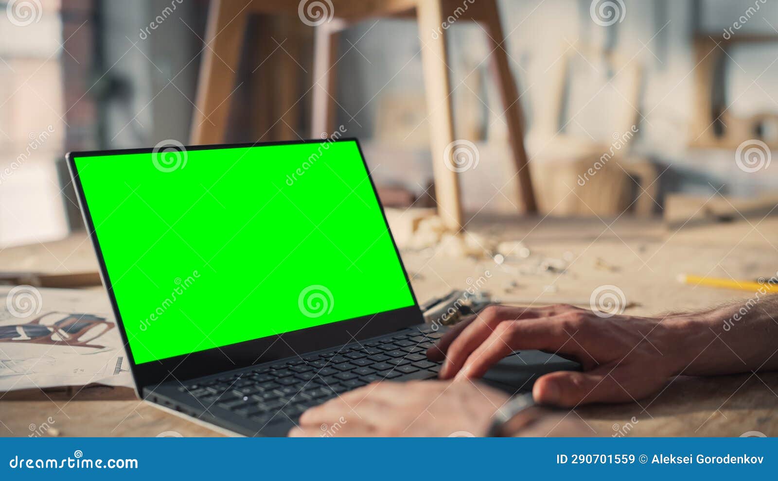 Close Up Shot of a Person Using Laptop Computer with Green Screen ...