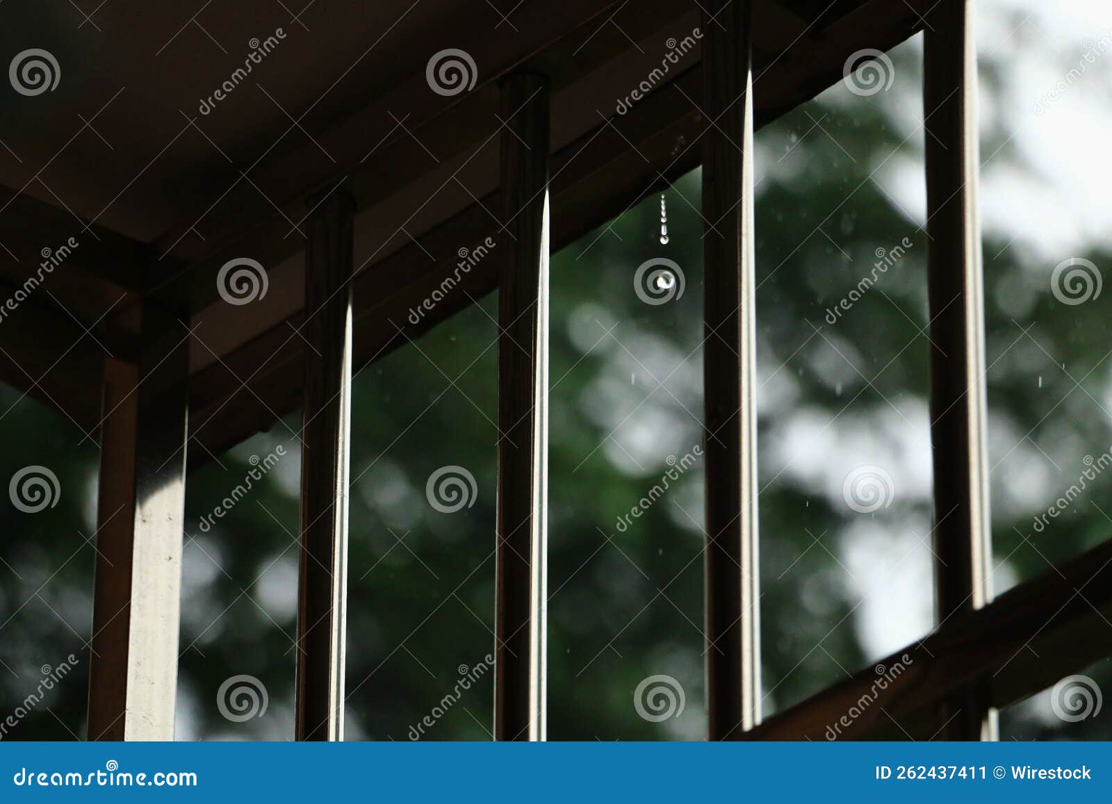 Close-up Shot of a Raindrop Falling from a Rooftop Stock Image - Image ...