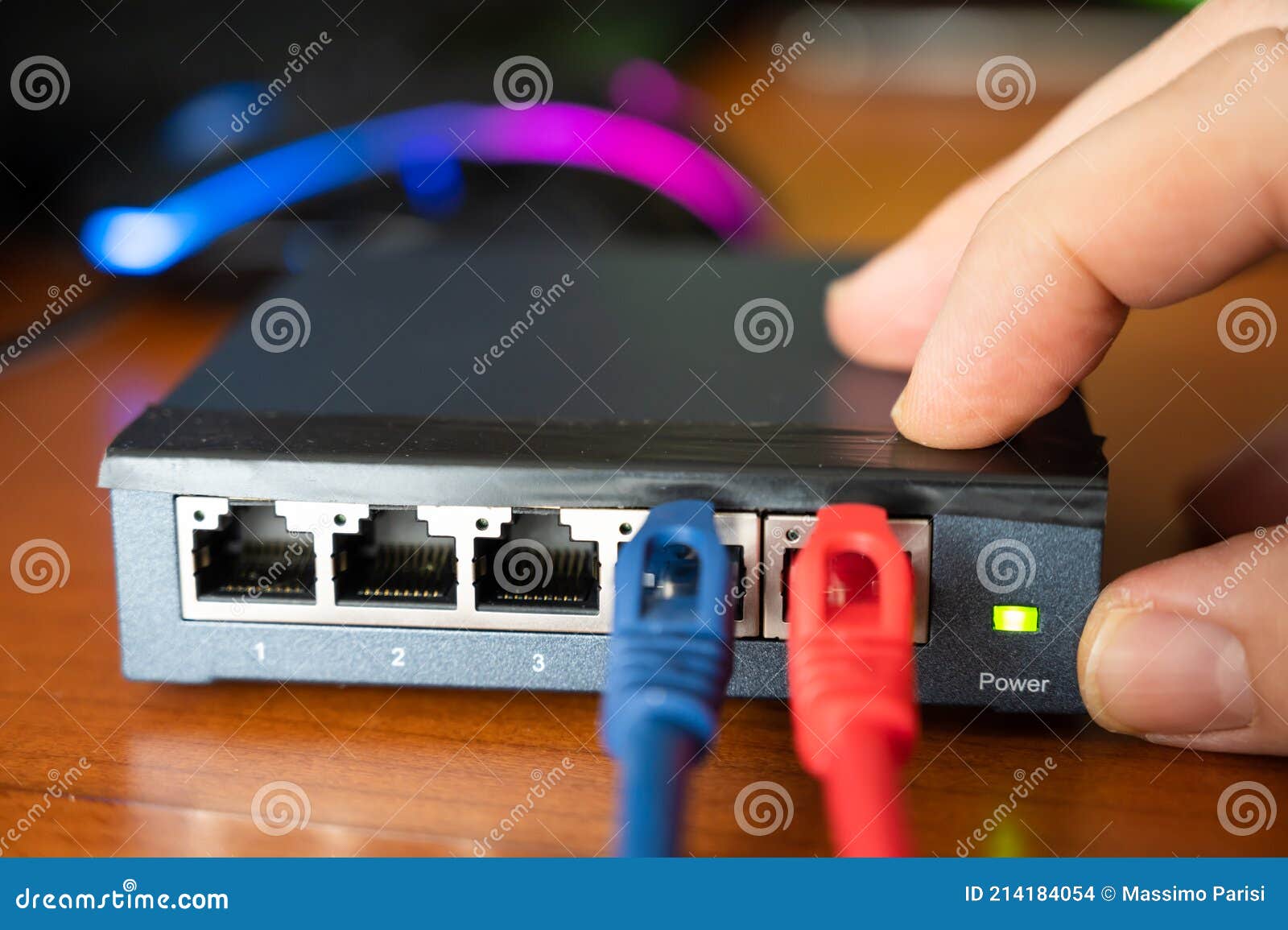 Close-up Shot of a Router - a Red Cable is Connected Next To the Blue ...