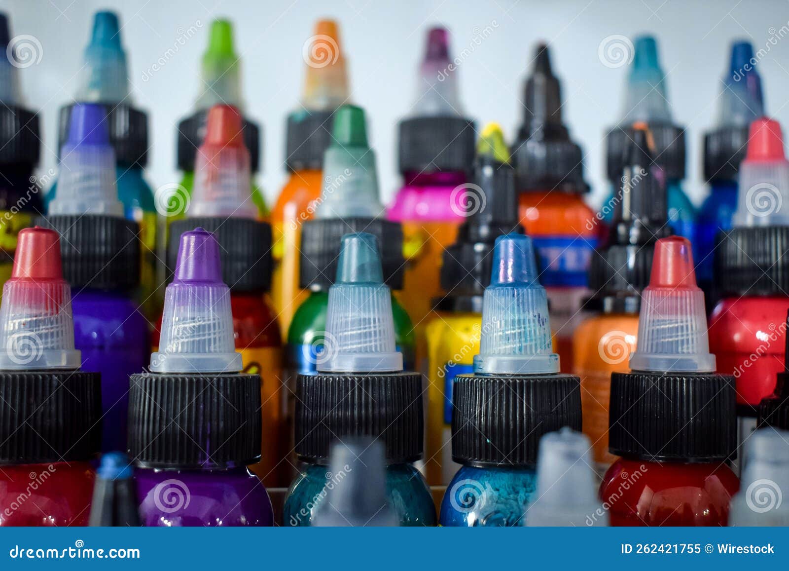 Close-up Shot of Rows of Colorful Tattoo Inks in Plastic Bottles Stock ...