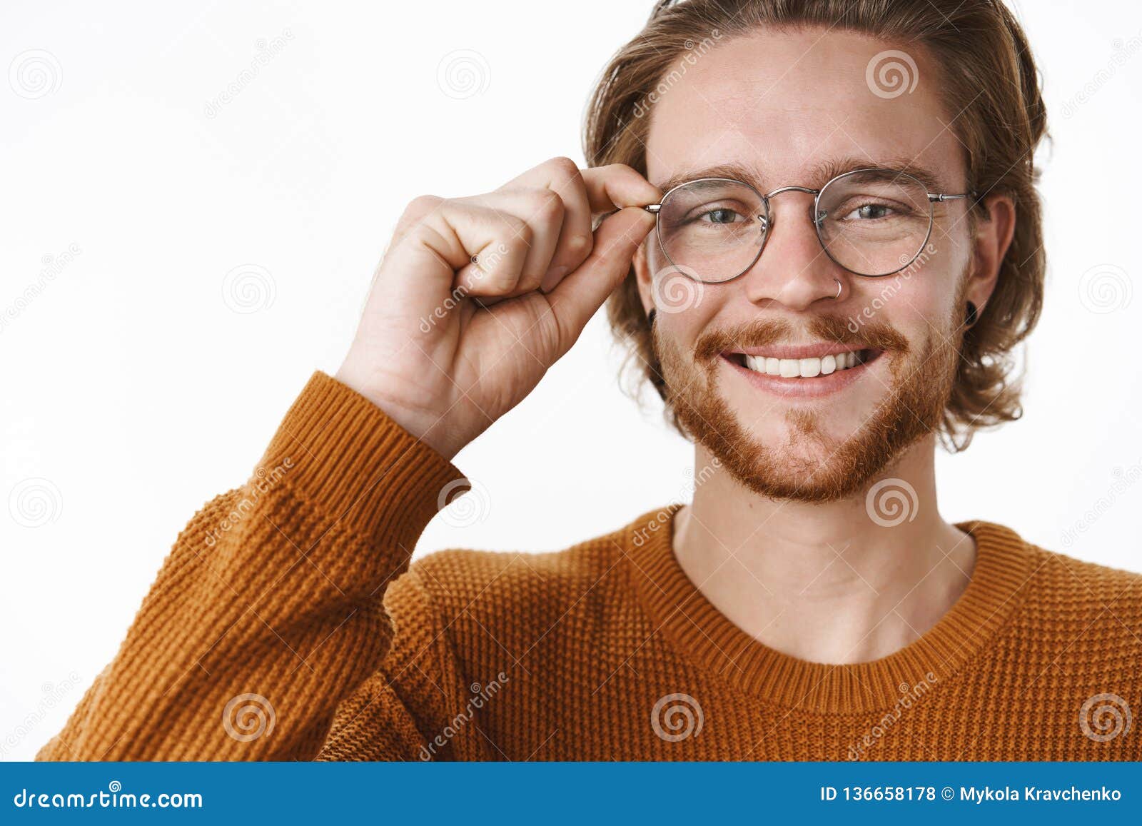 Close Up Shot Of Satisfied Accomplished And Smart Bearded Ginger Guy In