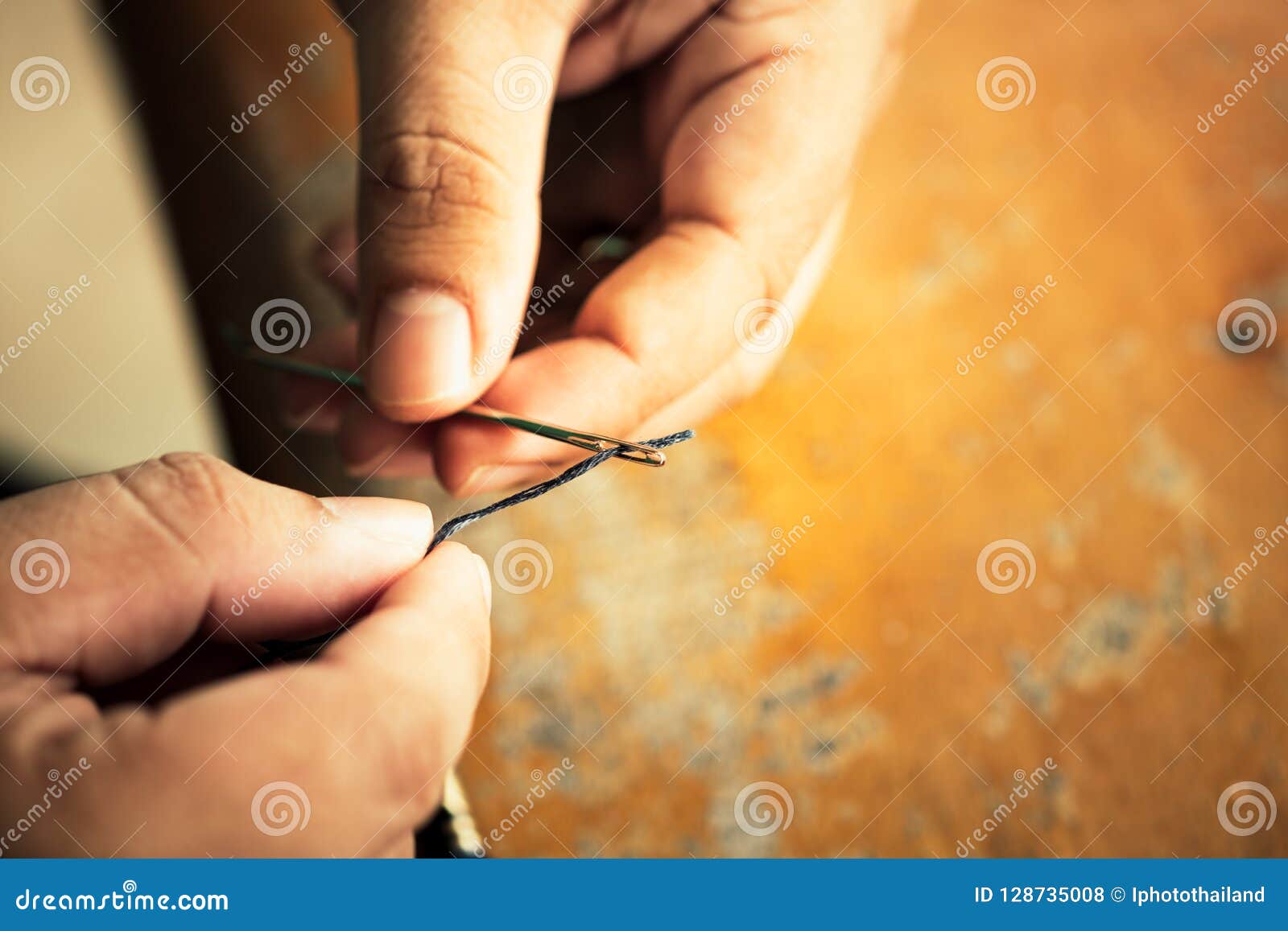 Close Up Shot of Thread Insert into a Needle on Human Finger. Co Stock ...