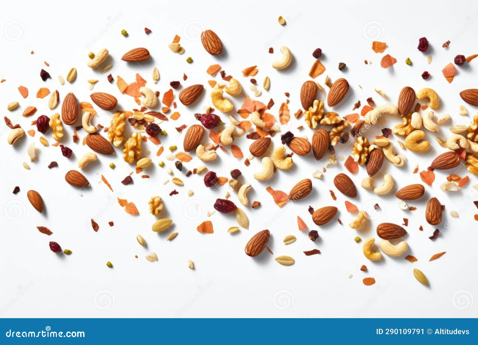 A Close-up Shot of Various Mixed Nuts Scattered on a White Surface ...