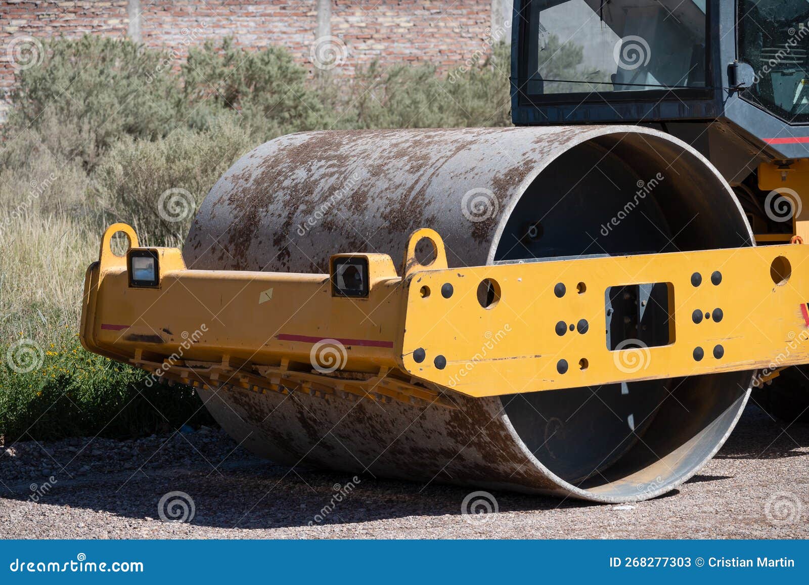 Close Up Shot of Vibrating Soil Compacting Roller Machine at Work Stock ...