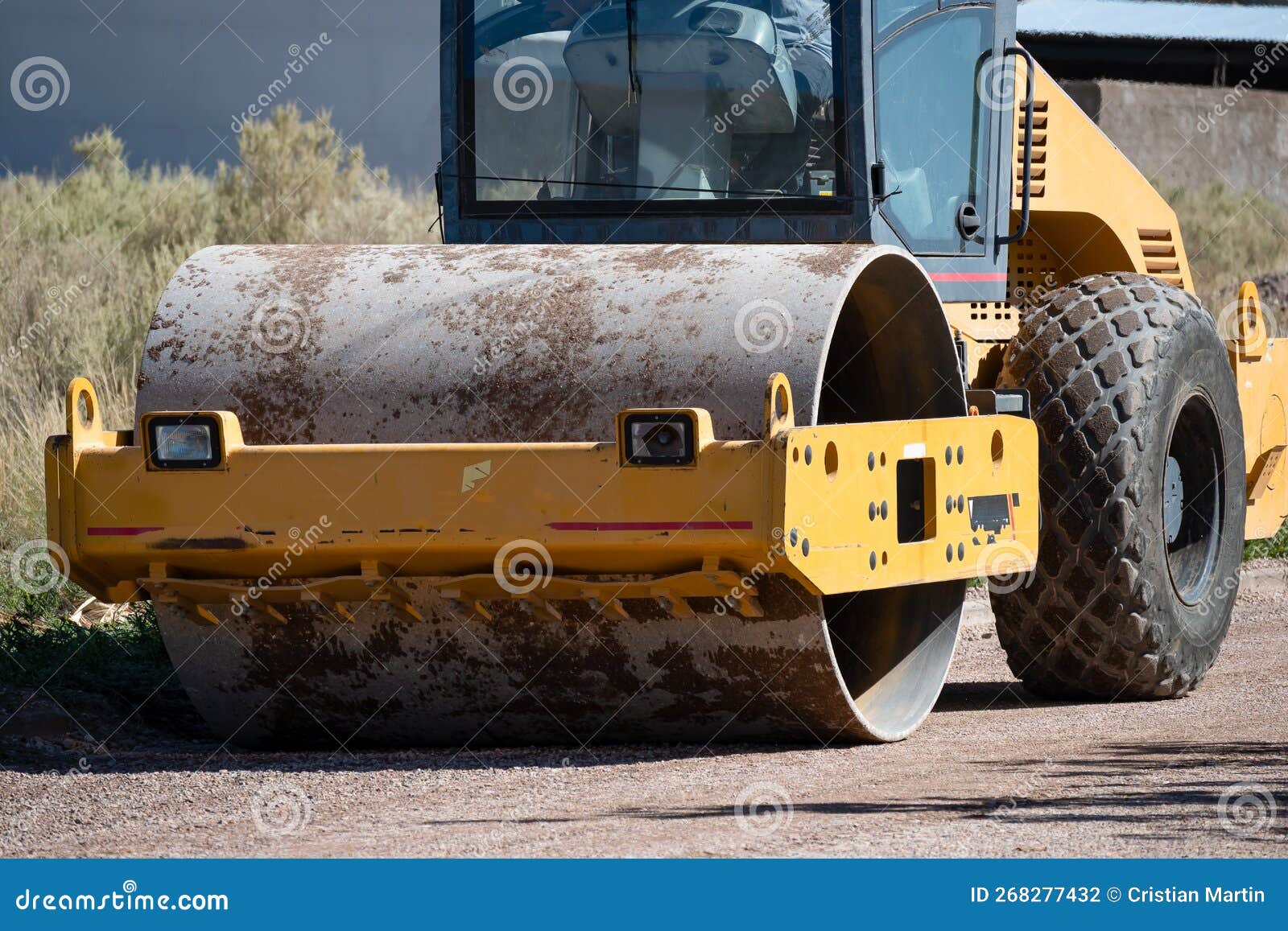 Close Up Shot of Vibrating Soil Compacting Roller Machine at Work Stock ...