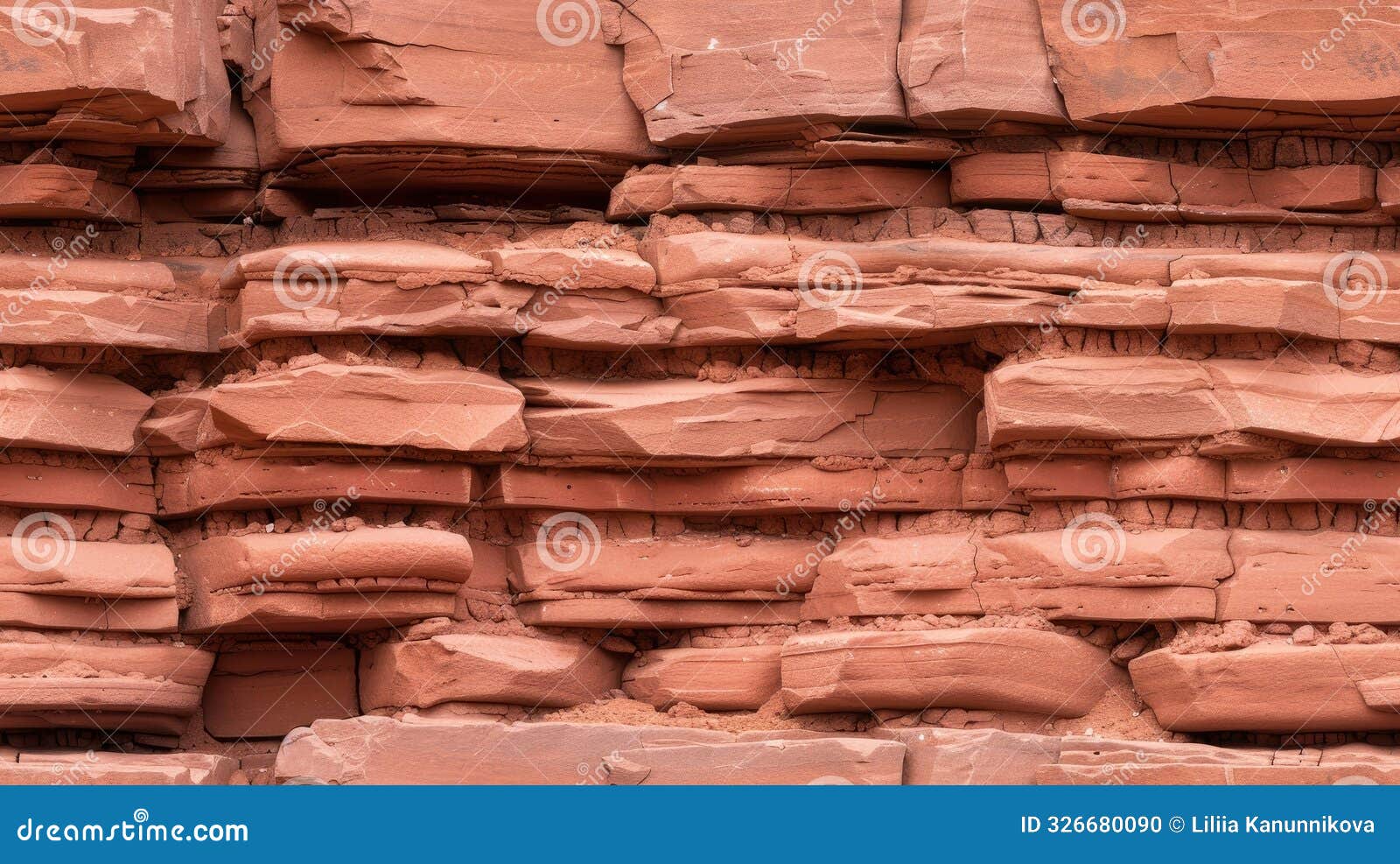 A Close-up Shot of a Wall Made of Red Sandstone Blocks. the Blocks are ...