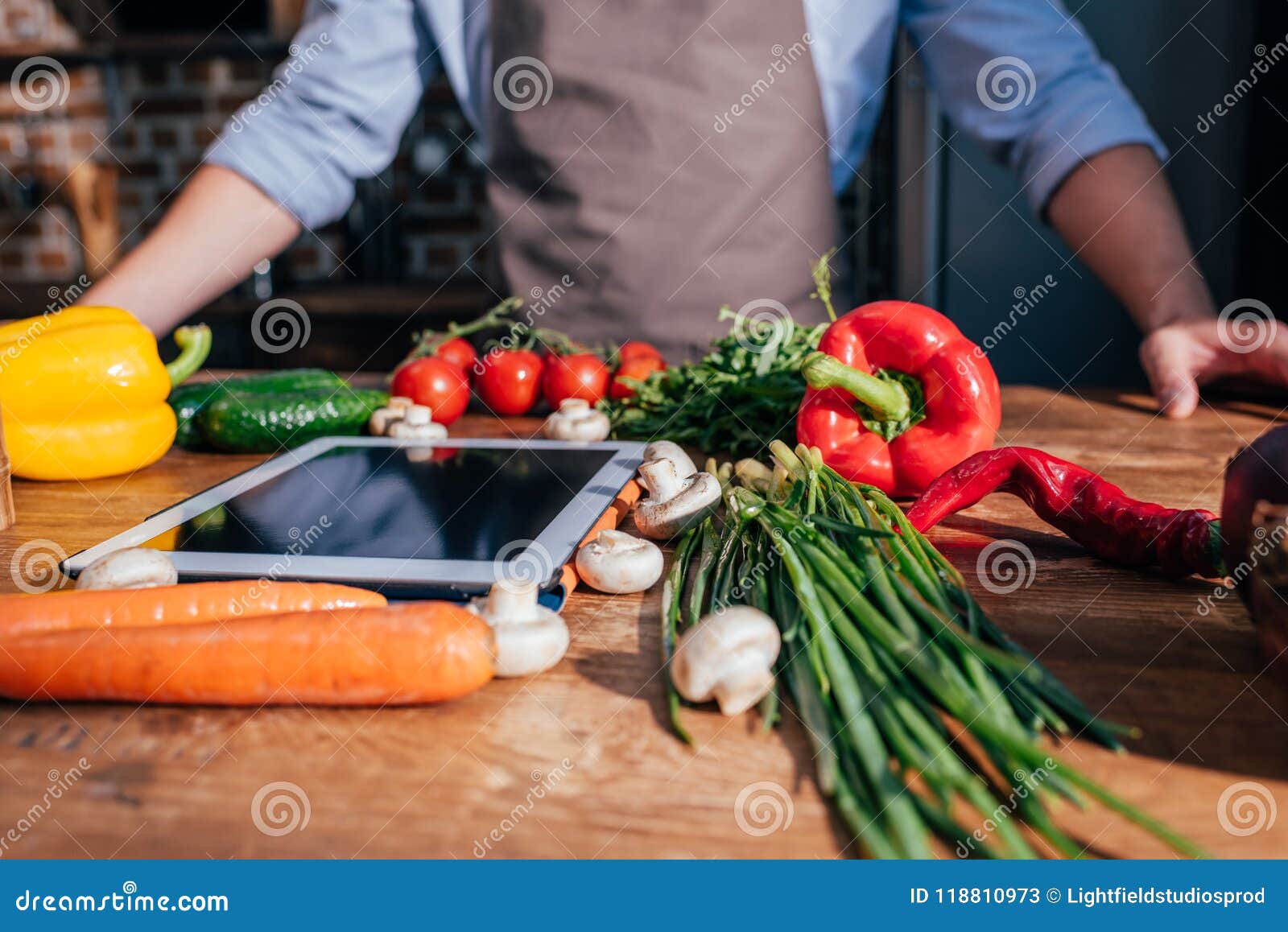 Close-up Shot of Young Man Cooking with Tablet Stock Image - Image of ...