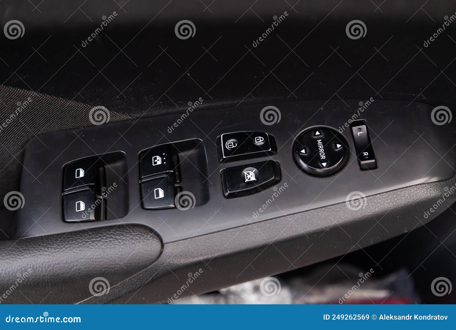Close-up of the Side Door Buttons: Window Adjustment Buttons, Door Lock ...