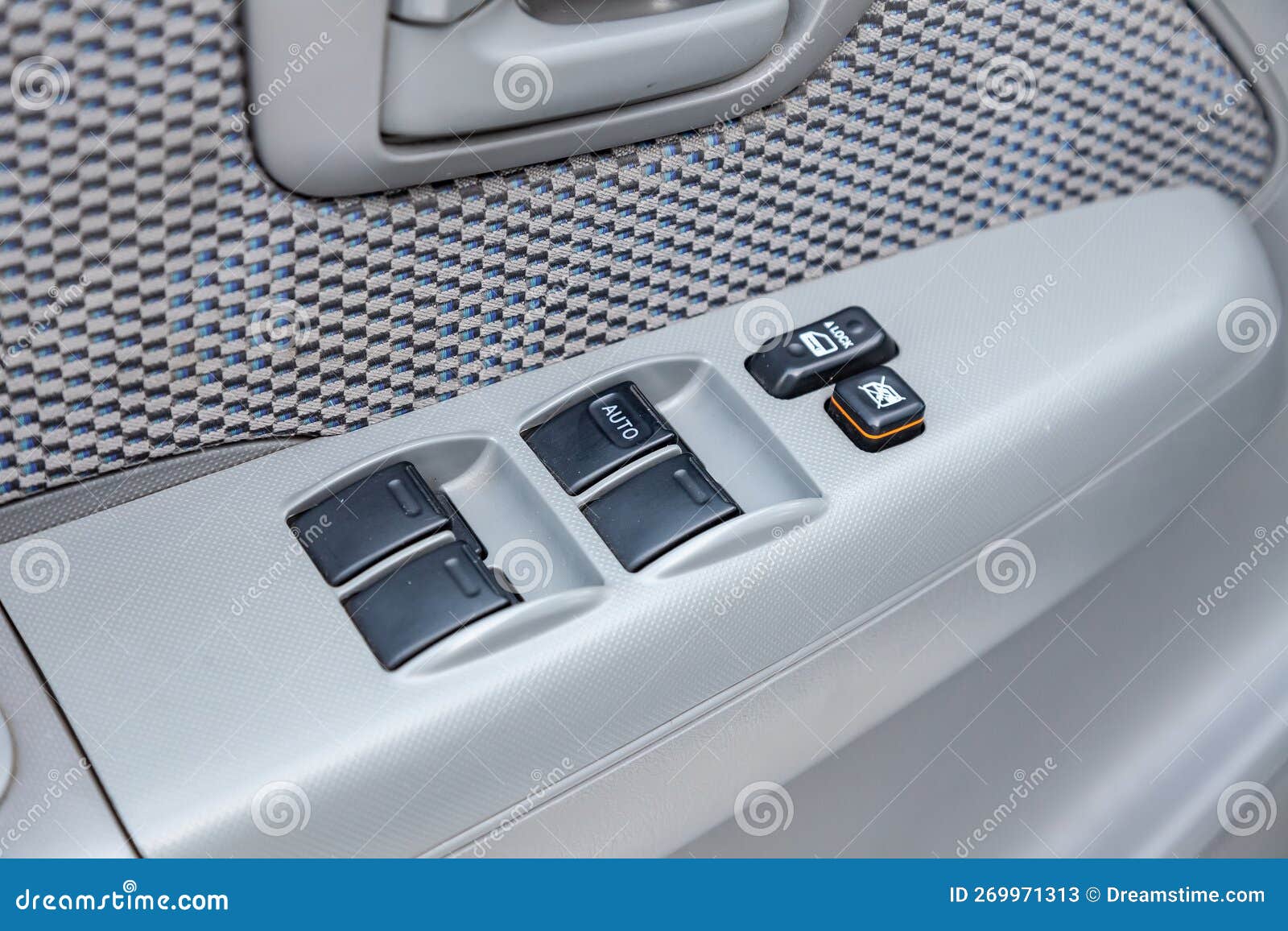 Close-up of the Side Door Buttons: Window Adjustment Buttons, Door Lock ...