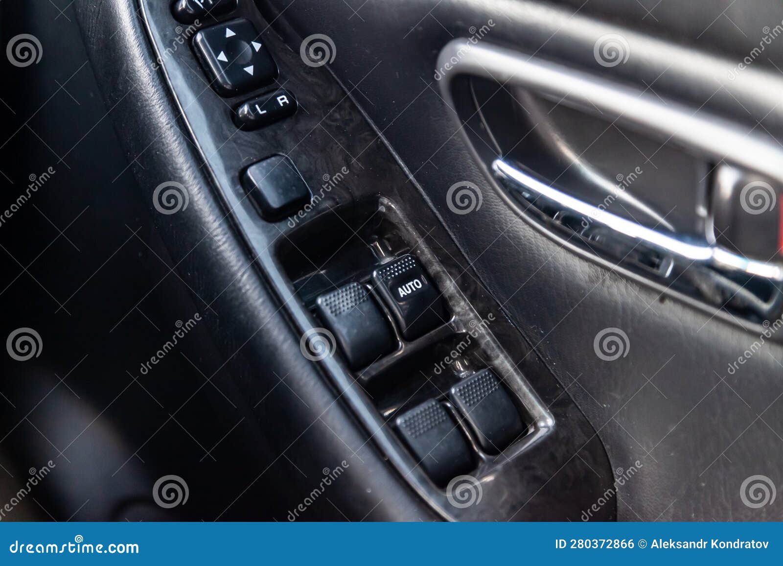 Close-up of the Side Door Buttons: Window Adjustment Buttons, Door Lock ...