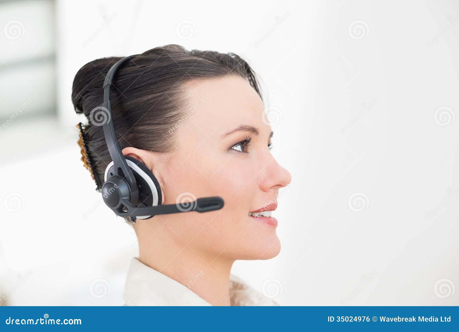 Close Up Side View of a Beautiful Businesswoman Using Headset Stock ...