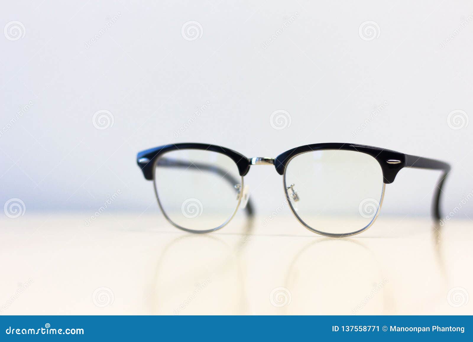Close Up Side View Glasses on Desk Table Stock Image - Image of concept ...