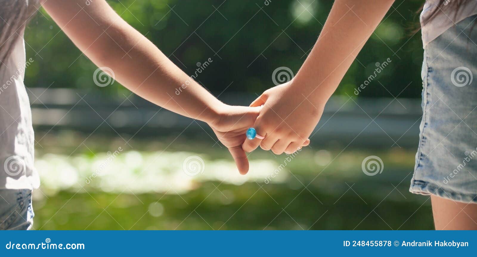 Close Up of Sister Hold Hand with Small Sister Stock Photo - Image of ...