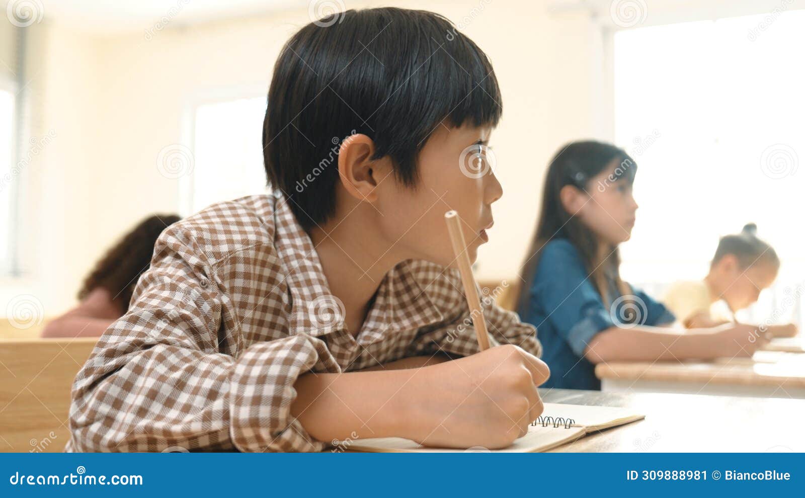 Close Up of Smart Asian Student Writing or Taking a Note during Test ...