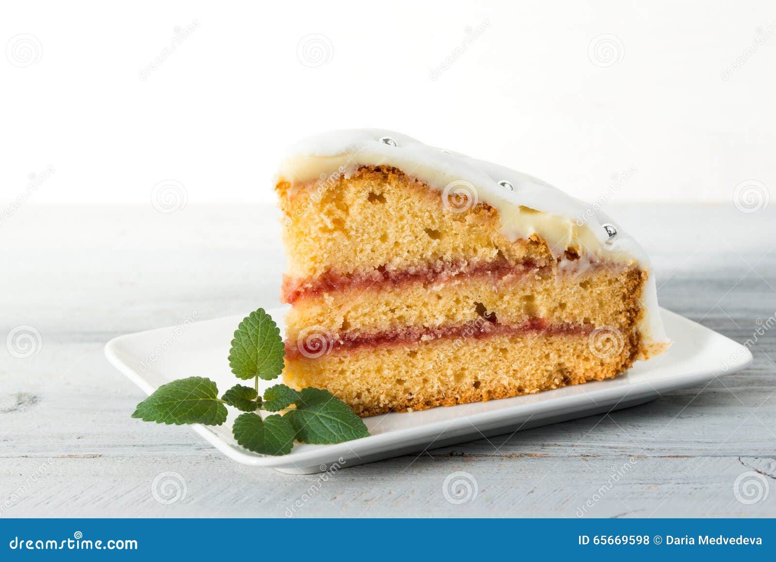 Close Up of a Slice of Cake on the Plate with Mint Leafs Stock Photo ...