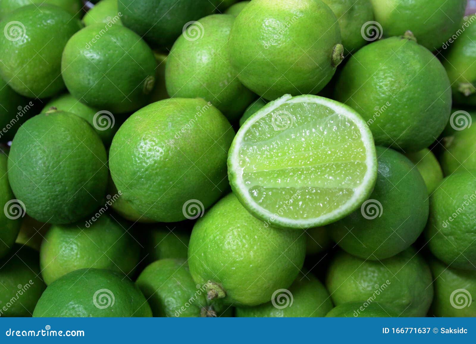 Close Up Slice Lime on Pile of Fresh Green Limes Fruit Stock Image ...