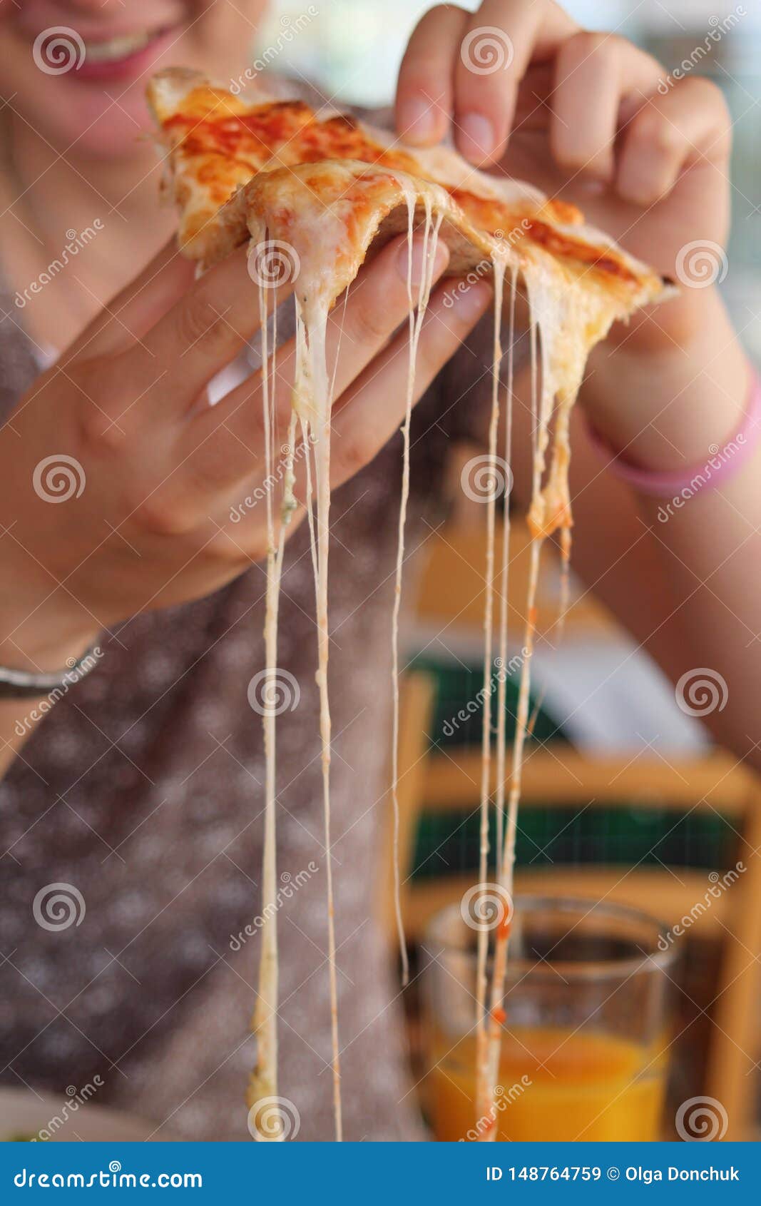 Slice of pizza in hands stock image. Image of fingernail - 148764759