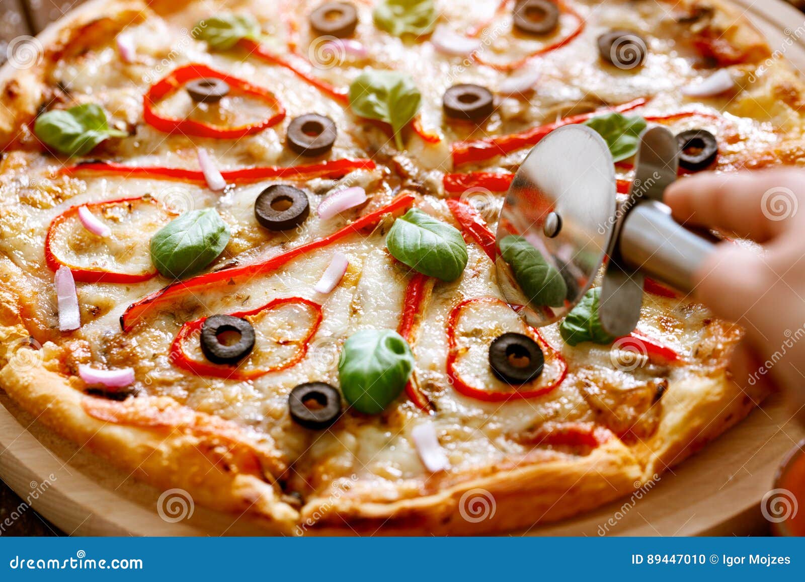 Close Up Slicing Pizza with Pizza Cutter Stock Photo - Image of ...