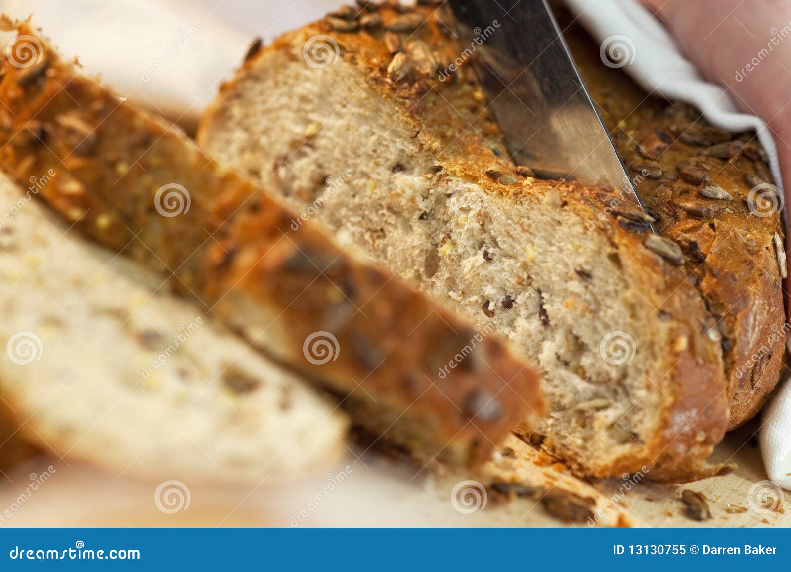 Close Up of Slicing Wholemeal Seeded Bread Loaf Stock Image - Image of ...