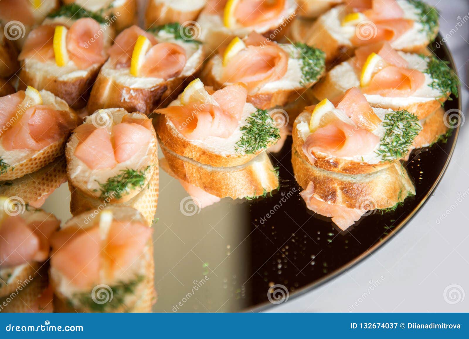 Close Up of Small Canapes Arranged on a Plate Over Light Background ...