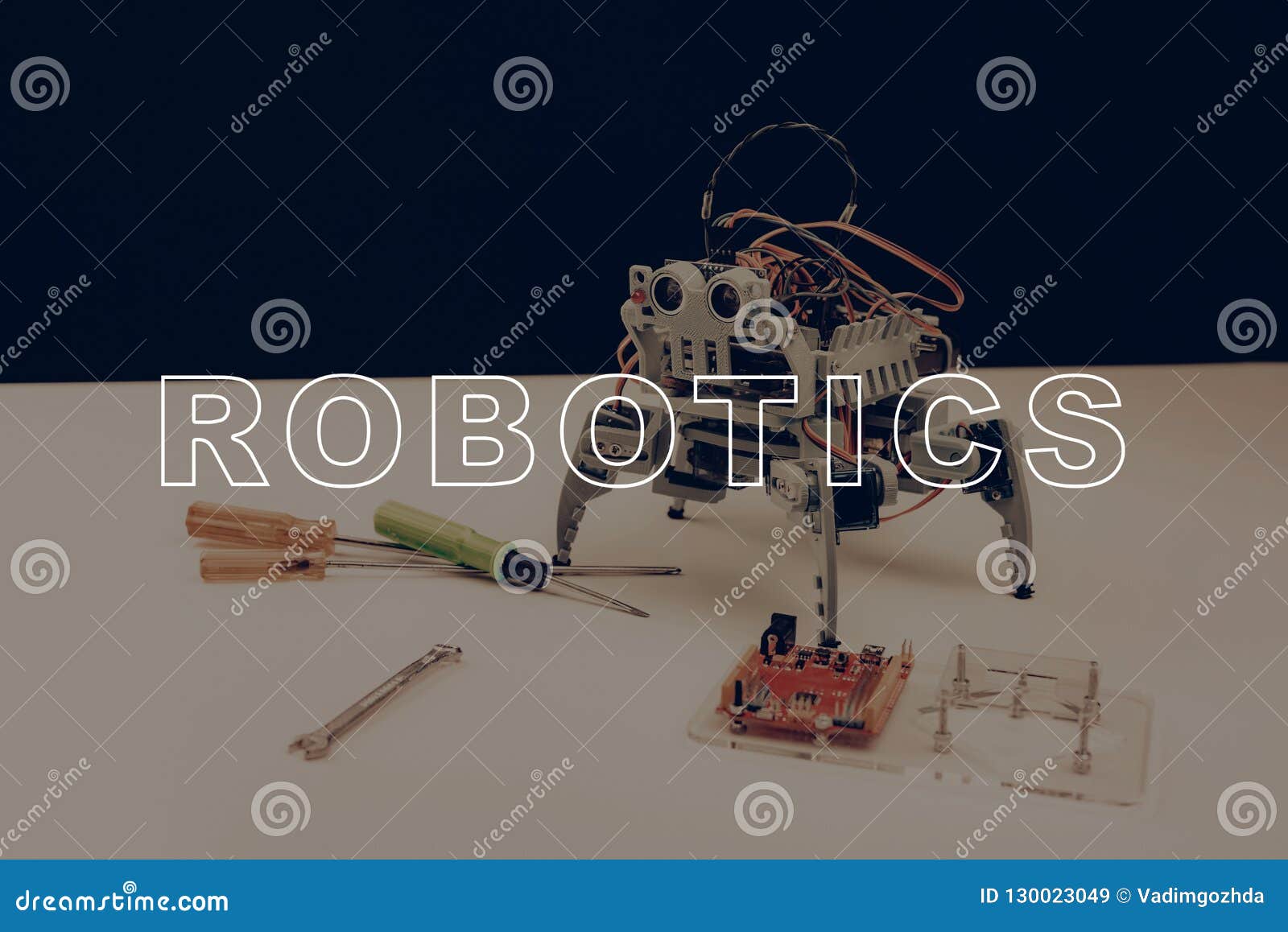 Close Up. a Small Gray Robot is on the Table Stock Image - Image of ...