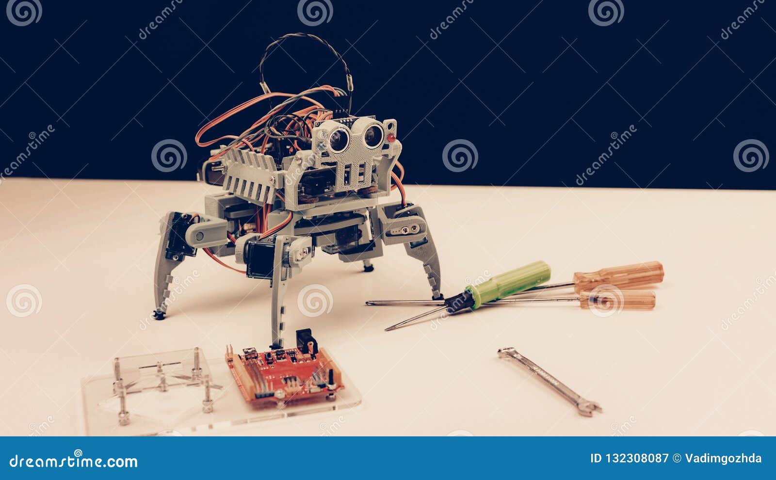 Close Up. Small Gray Robot with Tools on Table Stock Image - Image of ...