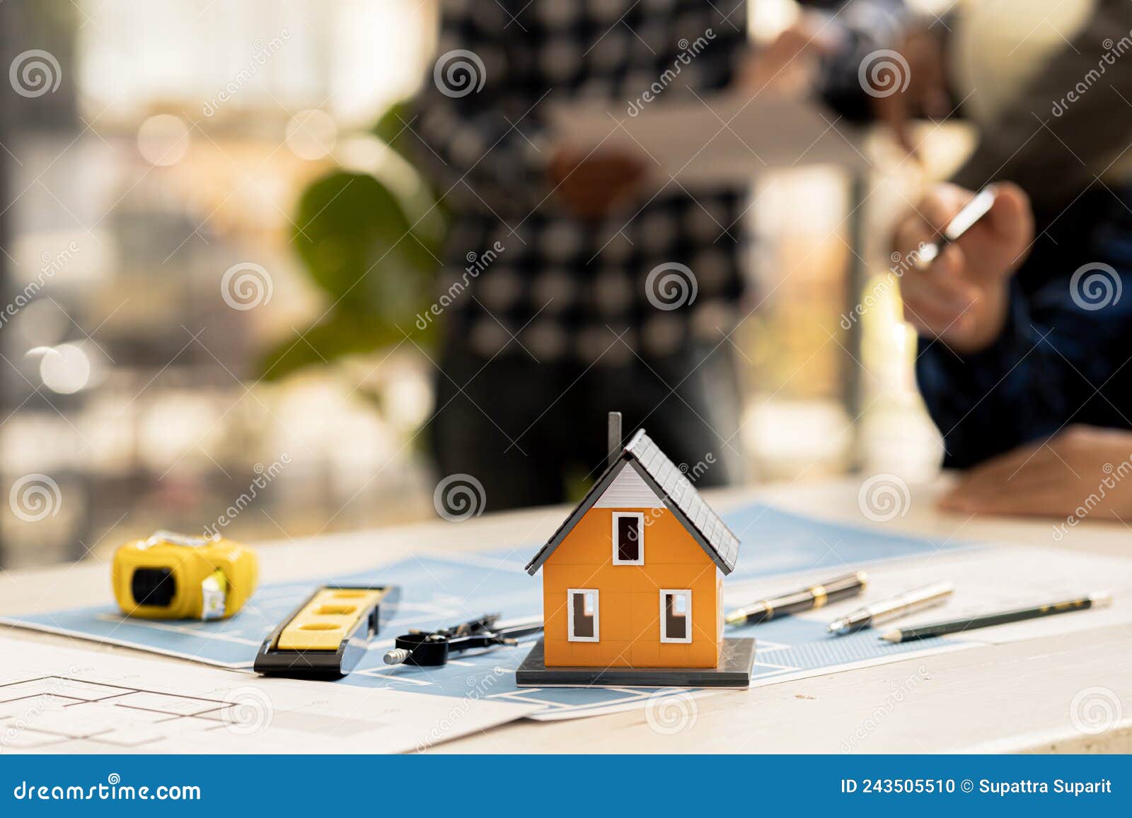 Close-up of a Small House Model, an Architect Engineer Designs the ...