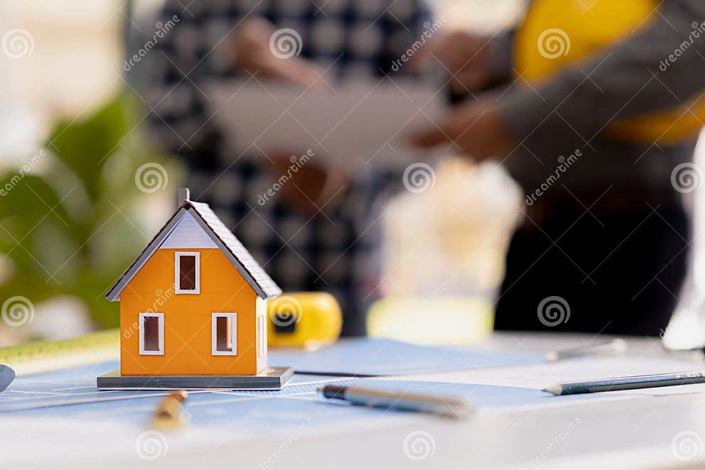 Close-up of a Small House Model, an Architect Engineer Designs the ...