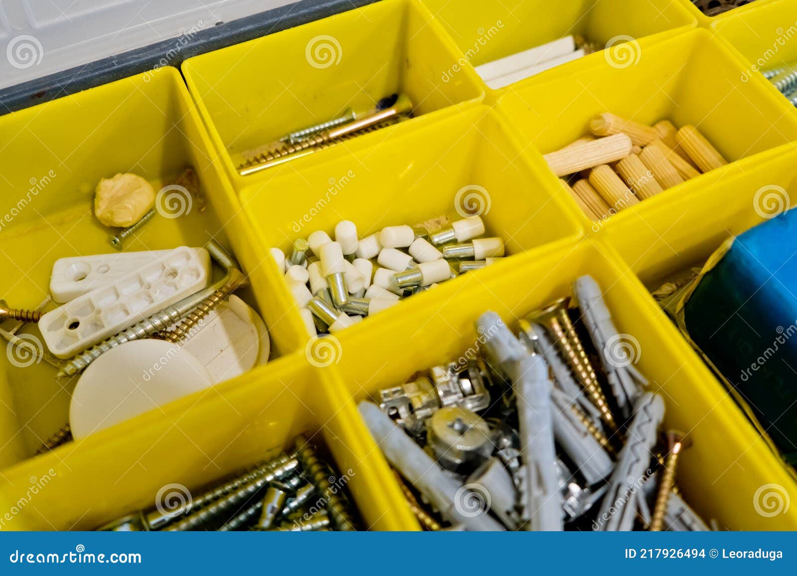Close-up of Small Plastic Yellow Boxes with Different Screws and ...