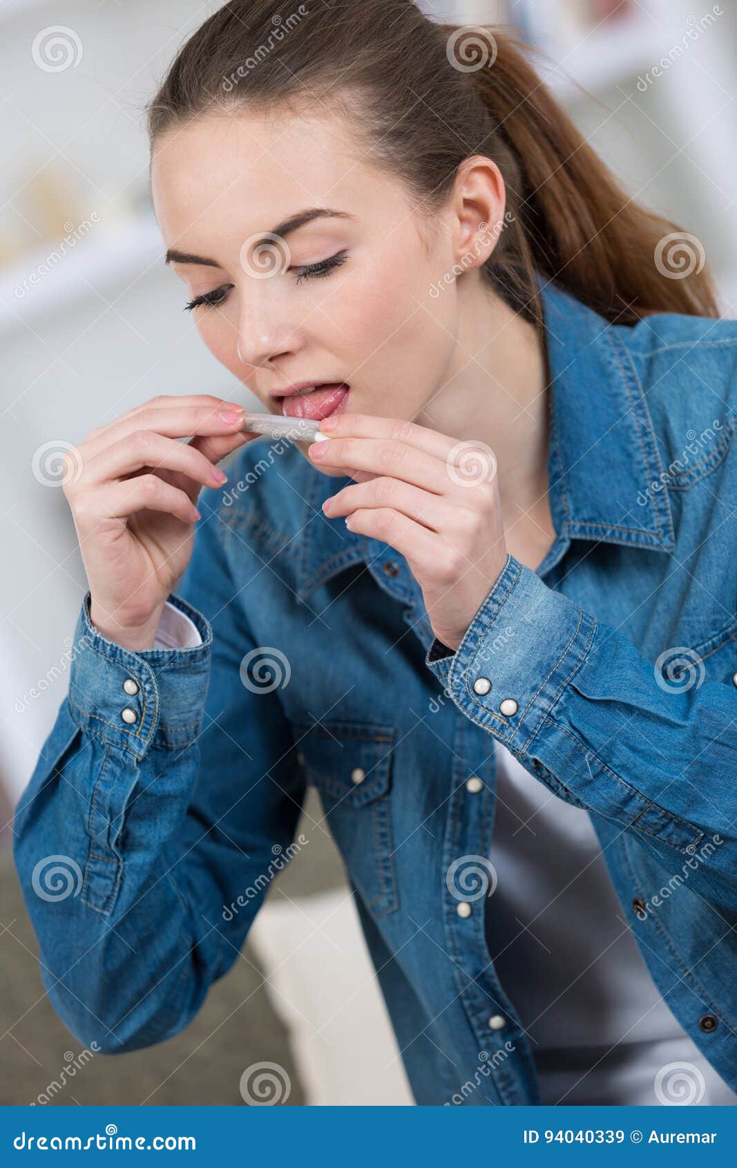 Close-up Smiling Brunette Making Cigarette Stock Image - Image of woman ...