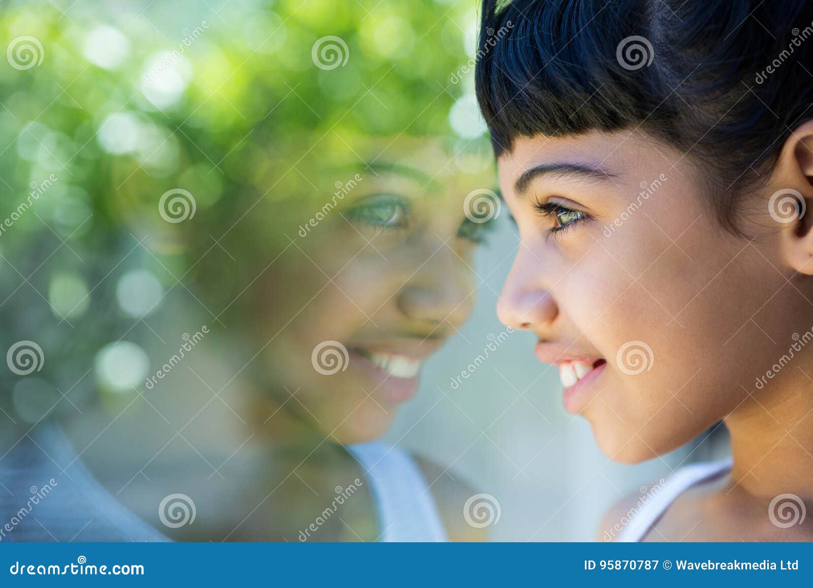 Close-up of Smiling Girl Looking through Window Stock Image - Image of ...