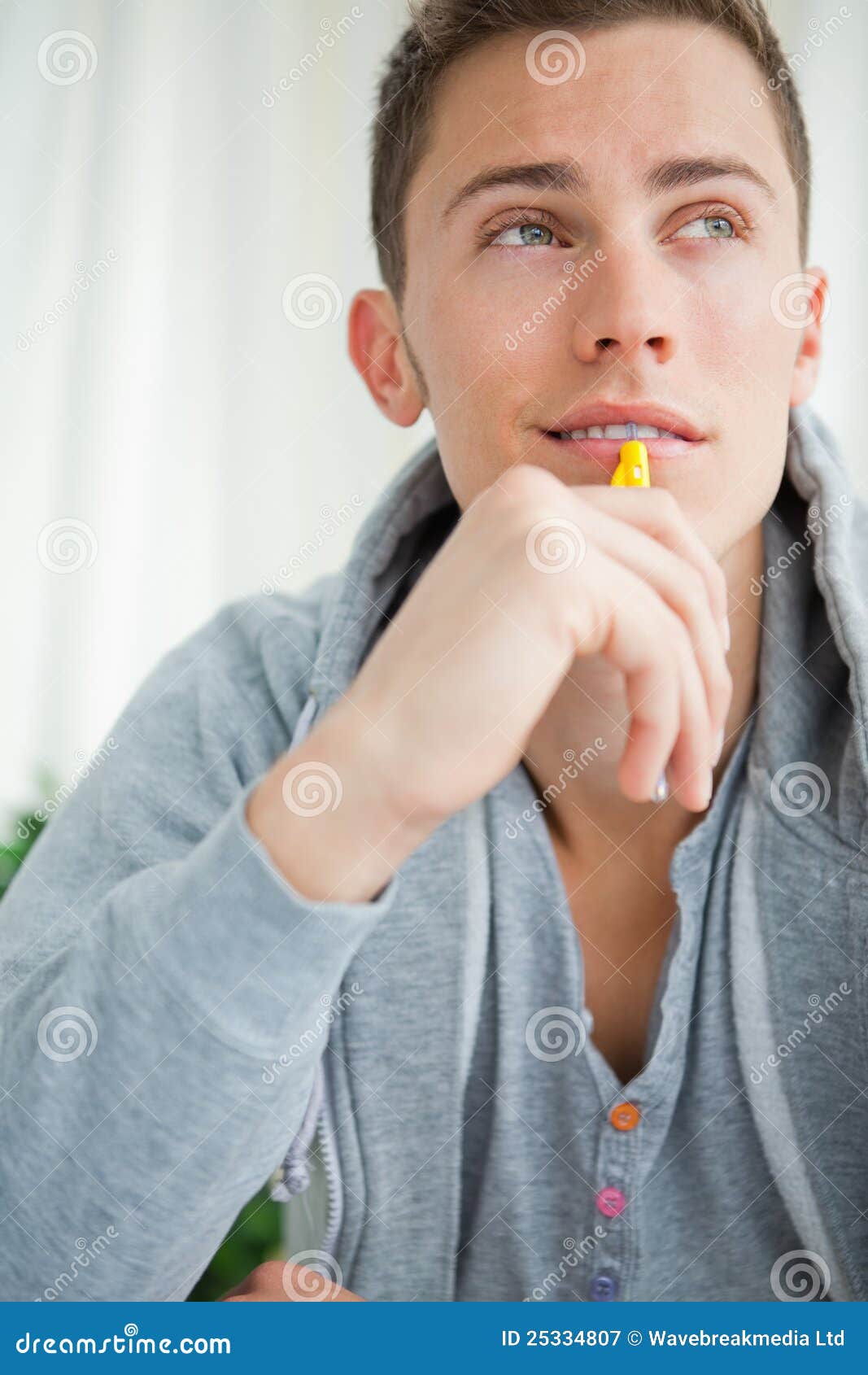 Close-up of a Smiling Student Chewing His Pencil Stock Image - Image of ...