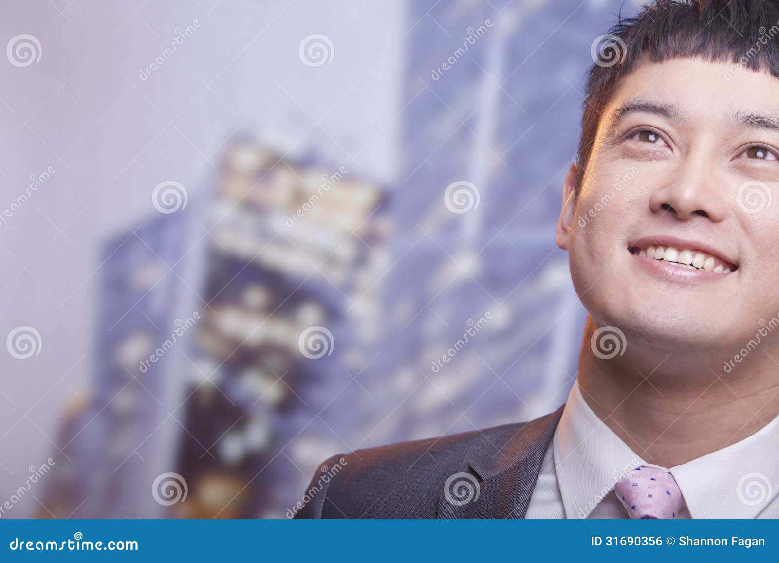 Close-up of Smiling Young Business Man Looking Up Stock Photo - Image ...