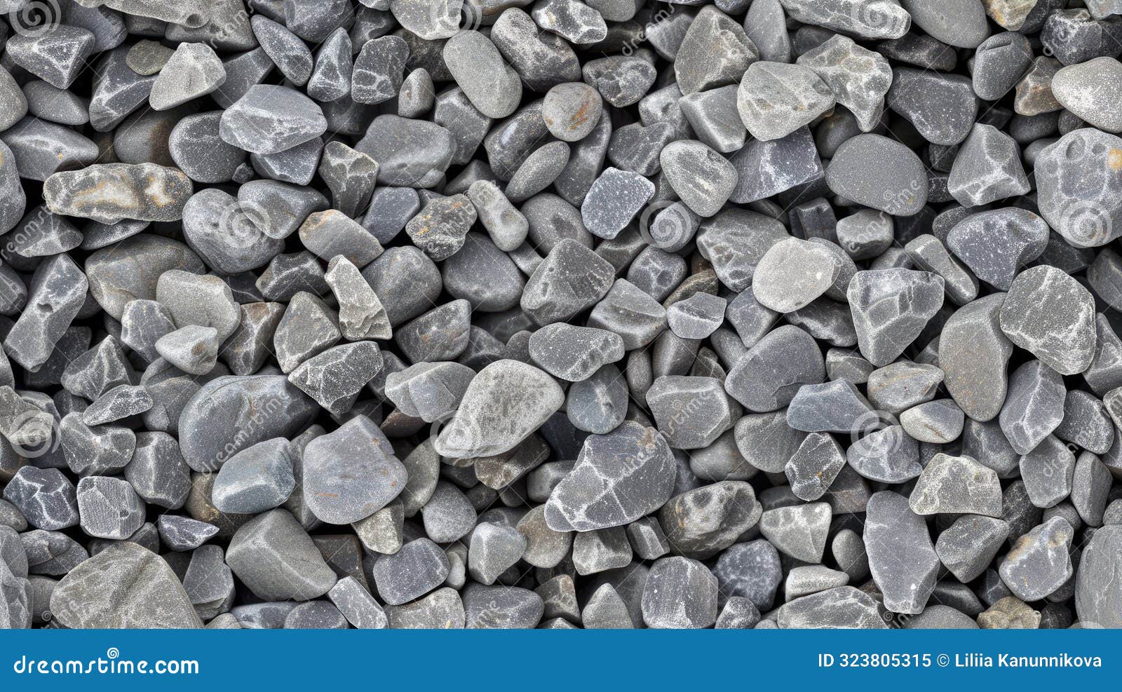 A Close Up of Smooth, Gray Pebbles, Creating a Natural, Textured ...