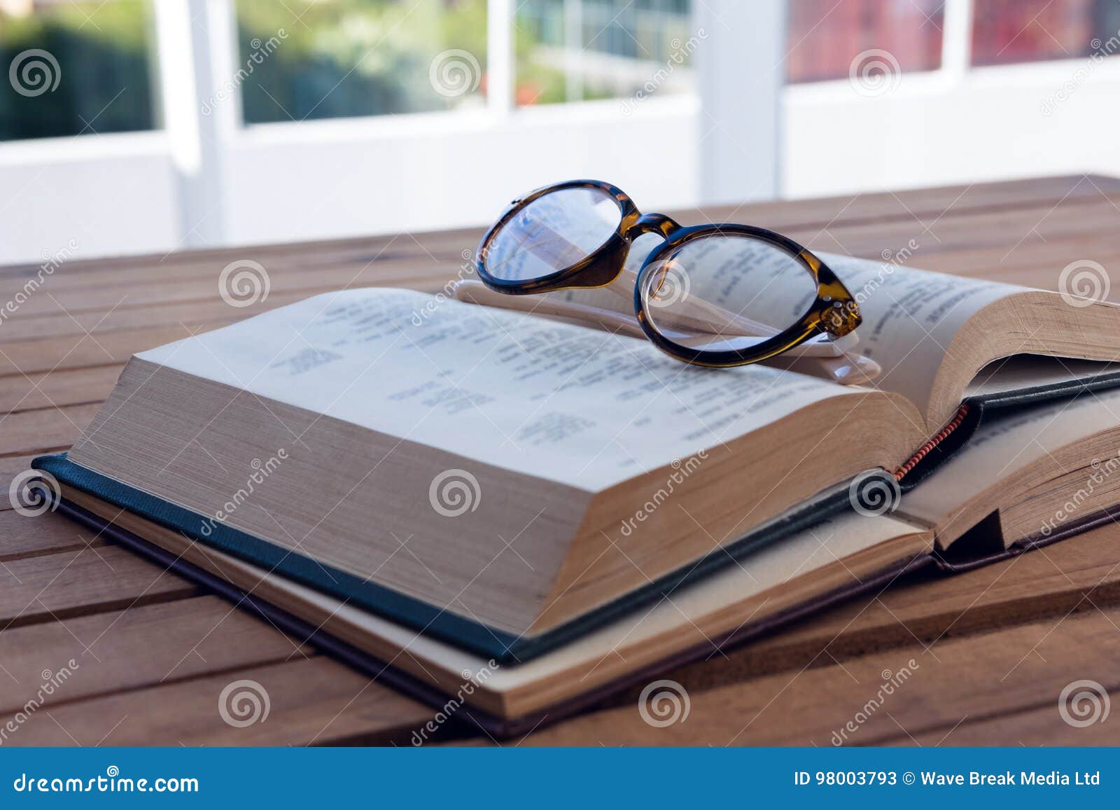 Close-up of Spectacles on Open Book Stock Image - Image of workplace ...