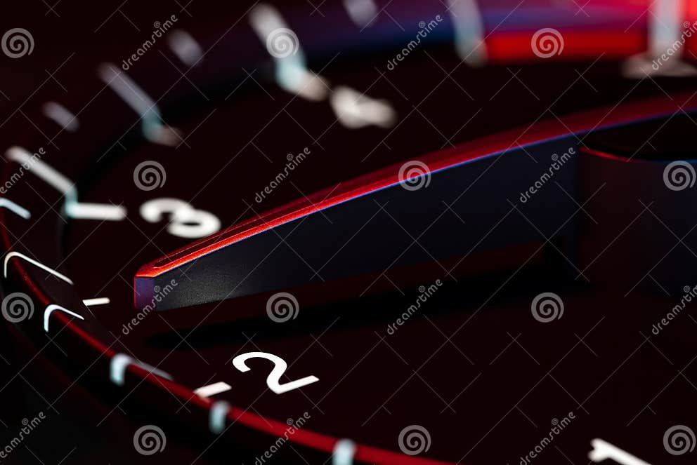 Close-up of Speedometer Needle Pointing at Two on Dashboard Display ...