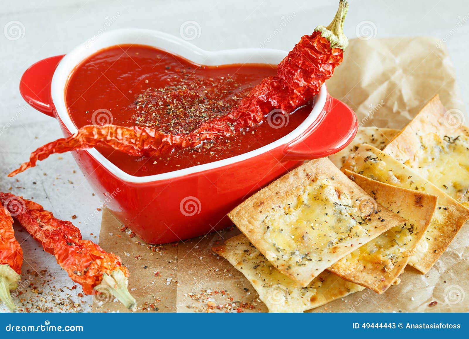 Close-Up Of Hot Spicy Nav Ratan Snacks In A Black Ceramic Bowl, Made ...