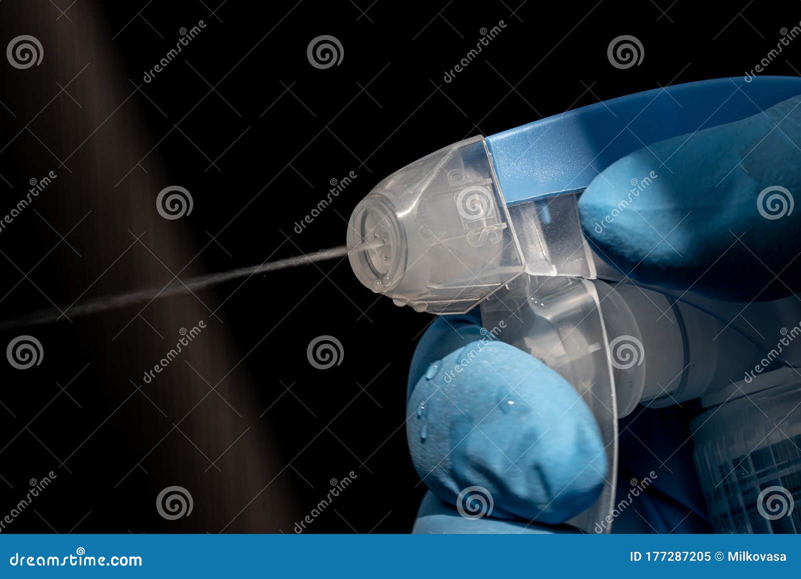 Close Up of a Spray Bottle Drops on Black Background Stock Image ...