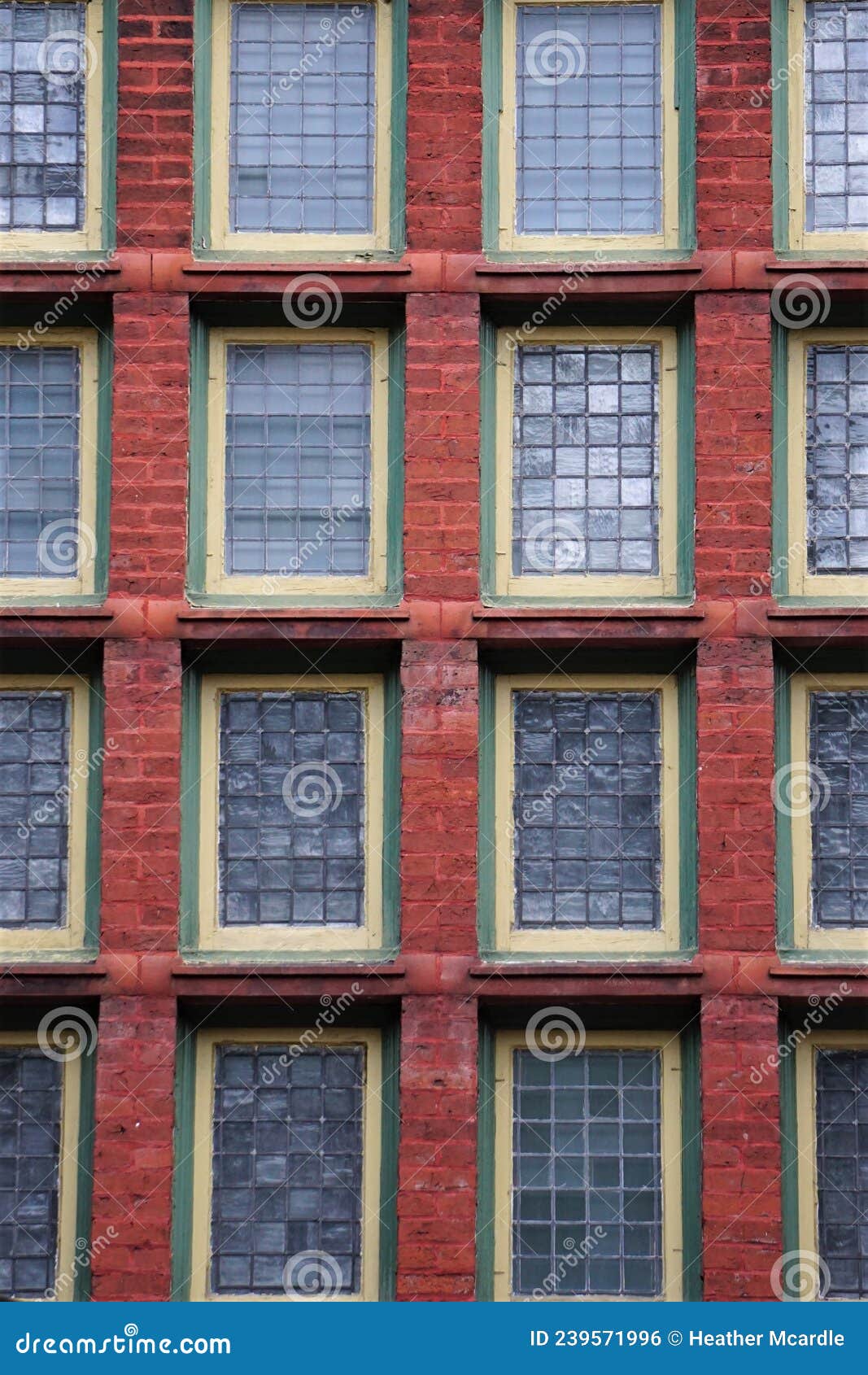 Close Up of Square Glass Windows in Red Brickface Building Stock Photo ...