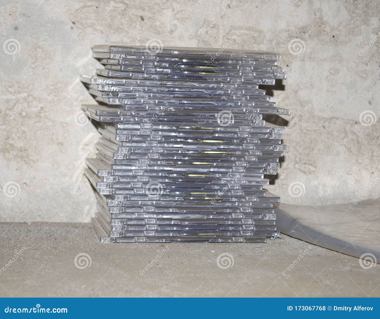 Close-up Stack of Compact Discs on Plywood and Concrete Wall Stock ...
