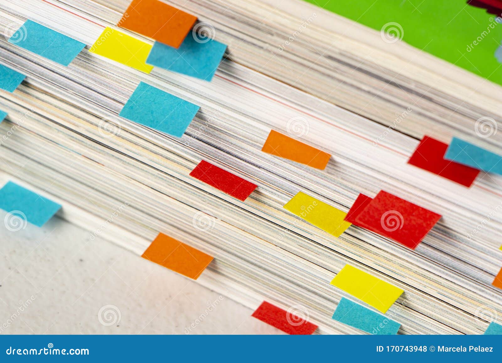 Close-up of Stack of Magazines with Colored Labels As Bookmarks Made ...