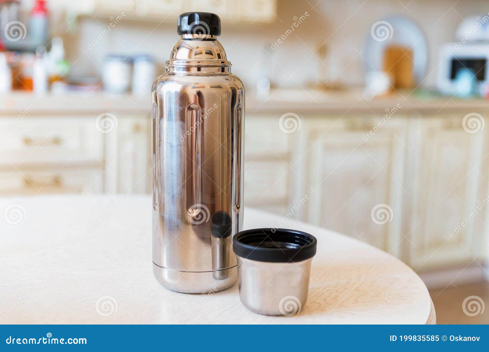 Close-up of Steel Thermos on White Kitchen Table Stock Image - Image of ...