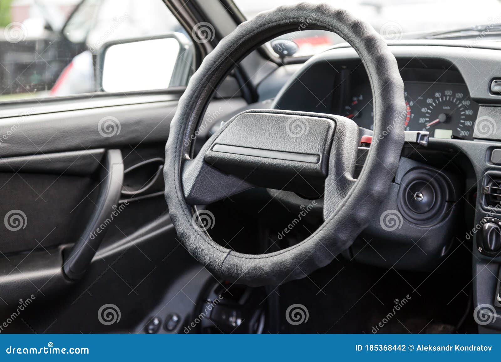 A Close-up of the Steering Wheel of a Russian Old Car on a Black ...