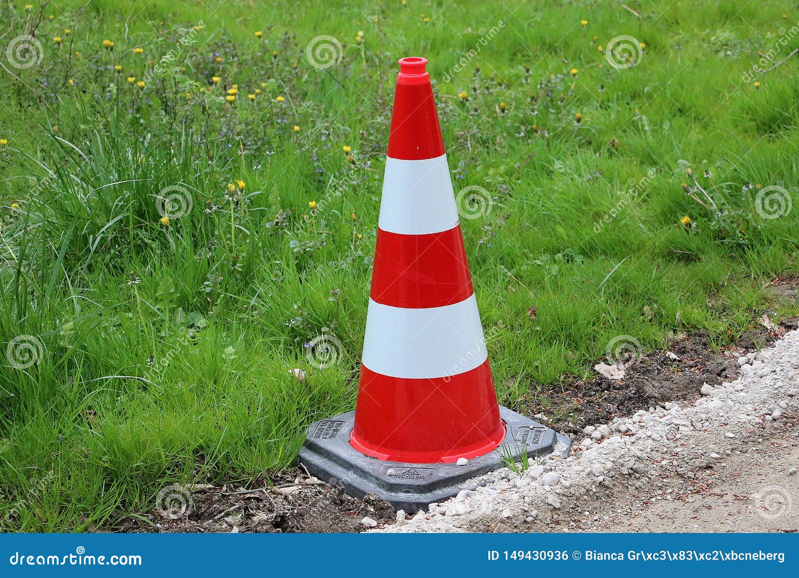 Striped Pylon is Standing at the Side of the Street Stock Photo - Image ...