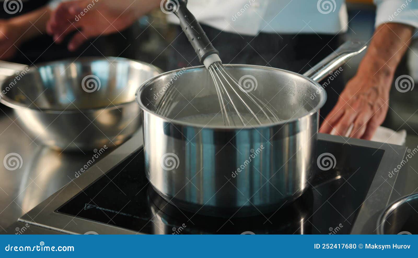 Close-up: Stirring Milk in a Bowl on the Stove Stock Footage - Video of ...