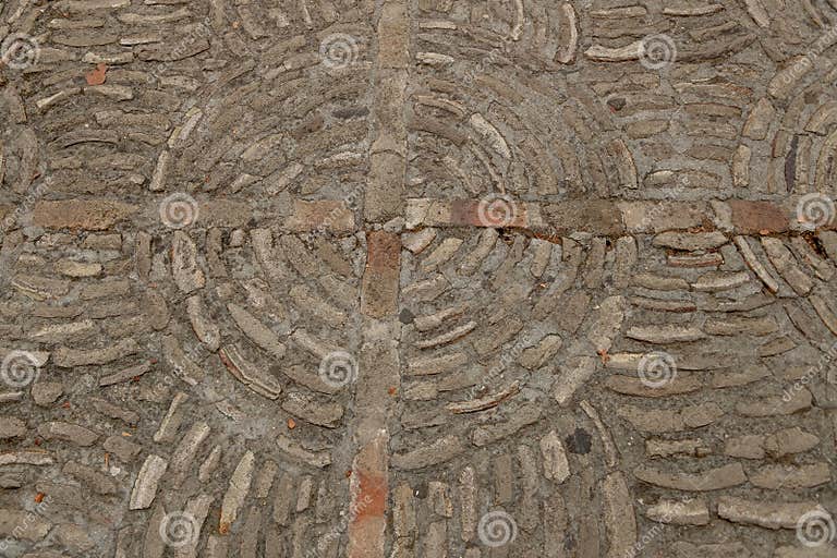 Close-up of a Stone Pavement Featuring a Circular Brick Pattern ...