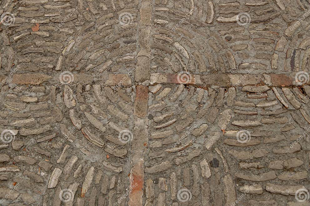 Close-up of a Stone Pavement Featuring a Circular Brick Pattern ...