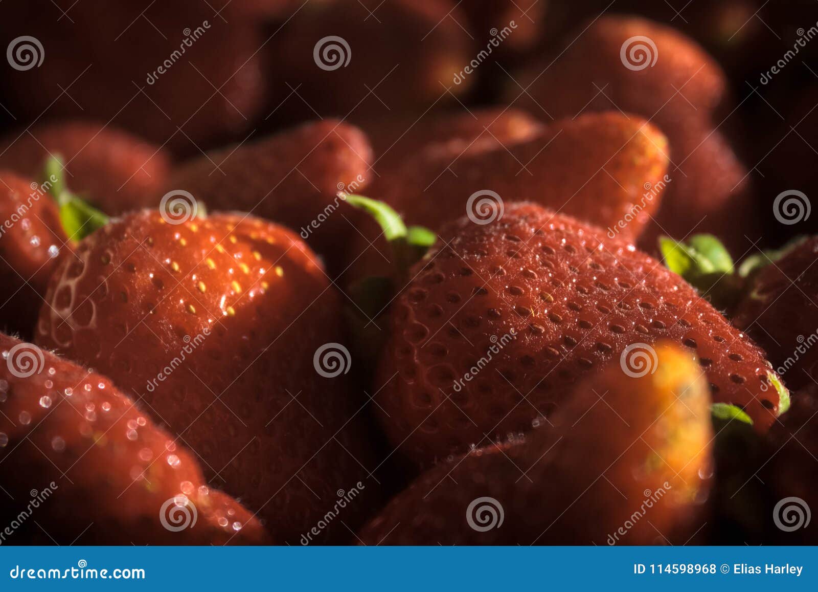 Close-Up of Strawberries with Dramatic Lighting Stock Photo - Image of ...