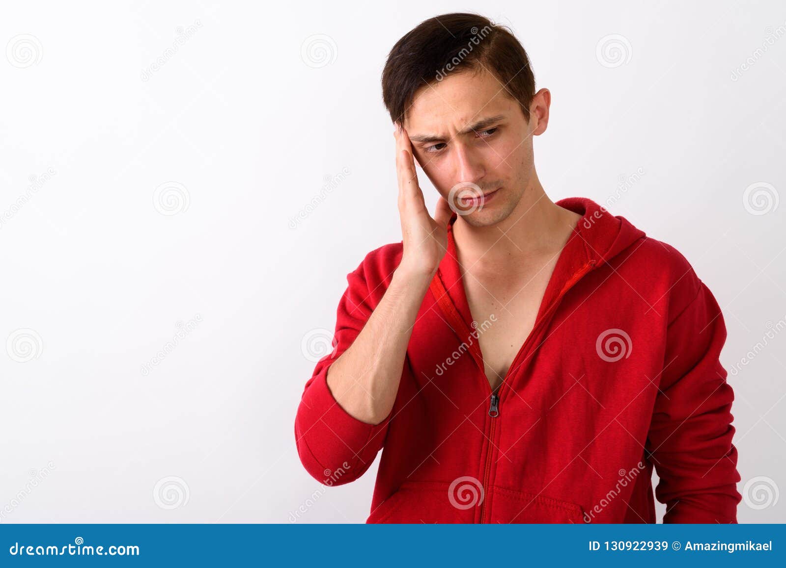 Close Up of Stressed Young Man Thinking while Having Headache Ag Stock ...
